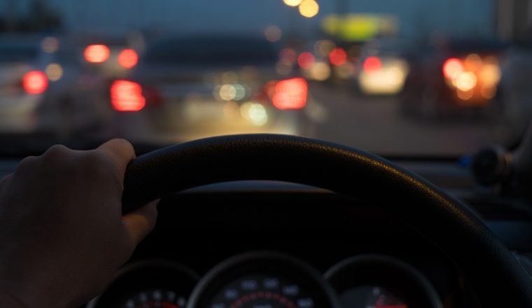A-driver-waiting-in-traffic-at-night-time - Streeton Lawyers